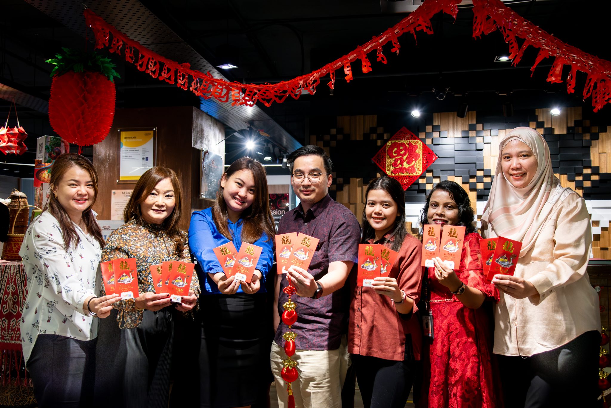 Ang Pao design promotes boat regatta - TTR Weekly